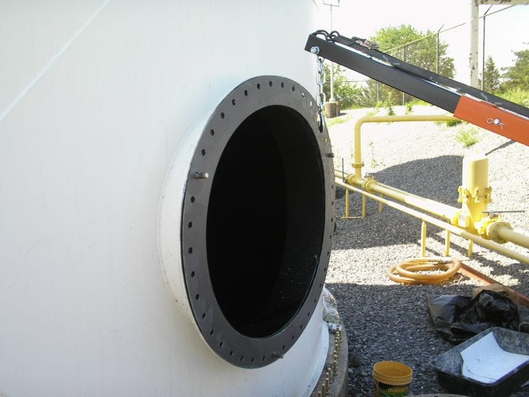 Manhole Gasket Replacement on 80,000 Storage Tansk - Aaron Environmental